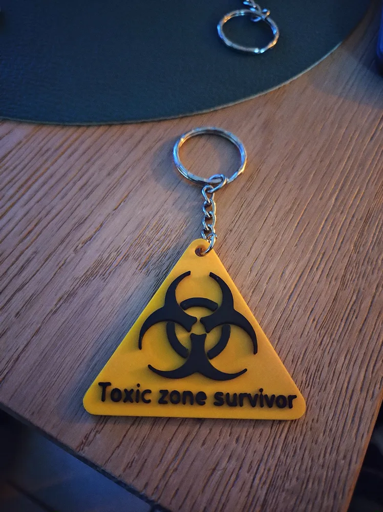 Toxic Zone Survivor keychain - Free 3D Print Model - MakerWorld