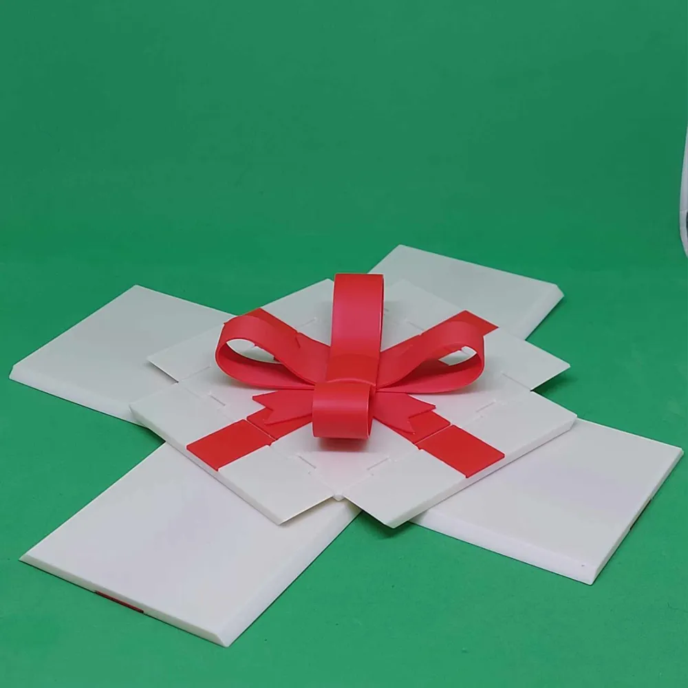 Articulated Present - Print in place - V1 by Waikikiprod MakerWorld ...