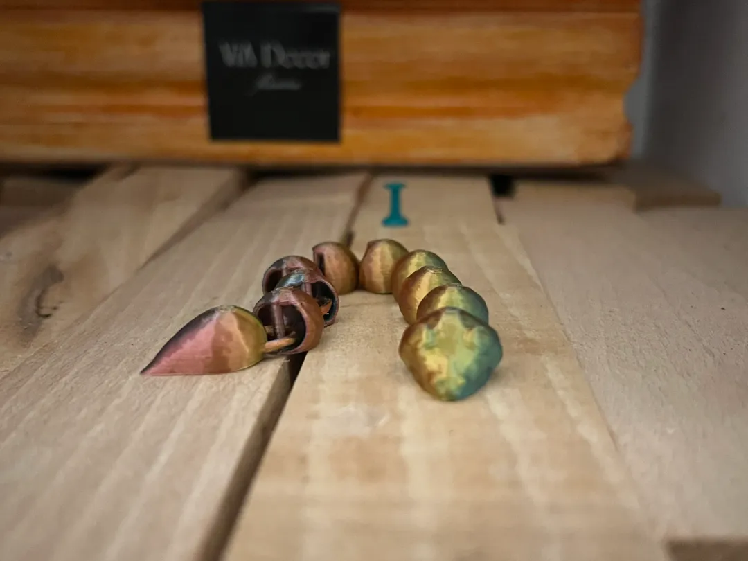 A cute flexi snake - Free 3D Print Model - MakerWorld