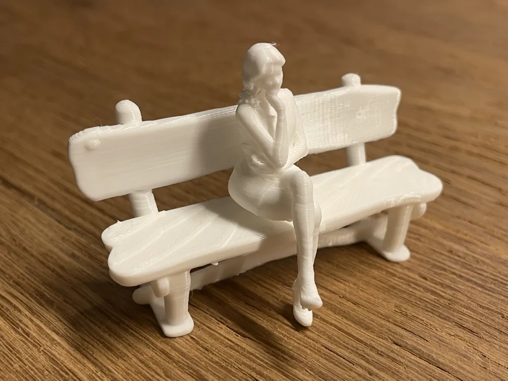 Small seated, pensive woman by 3D King MakerWorld: Download Free 3D Models