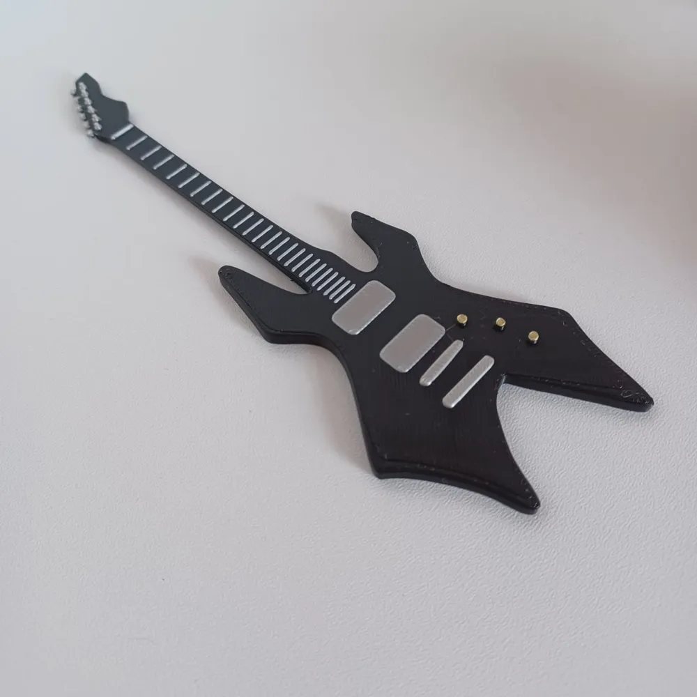 Mini guitarra eléctrica - Modelo de impresión 3D gratuito - MakerWorld