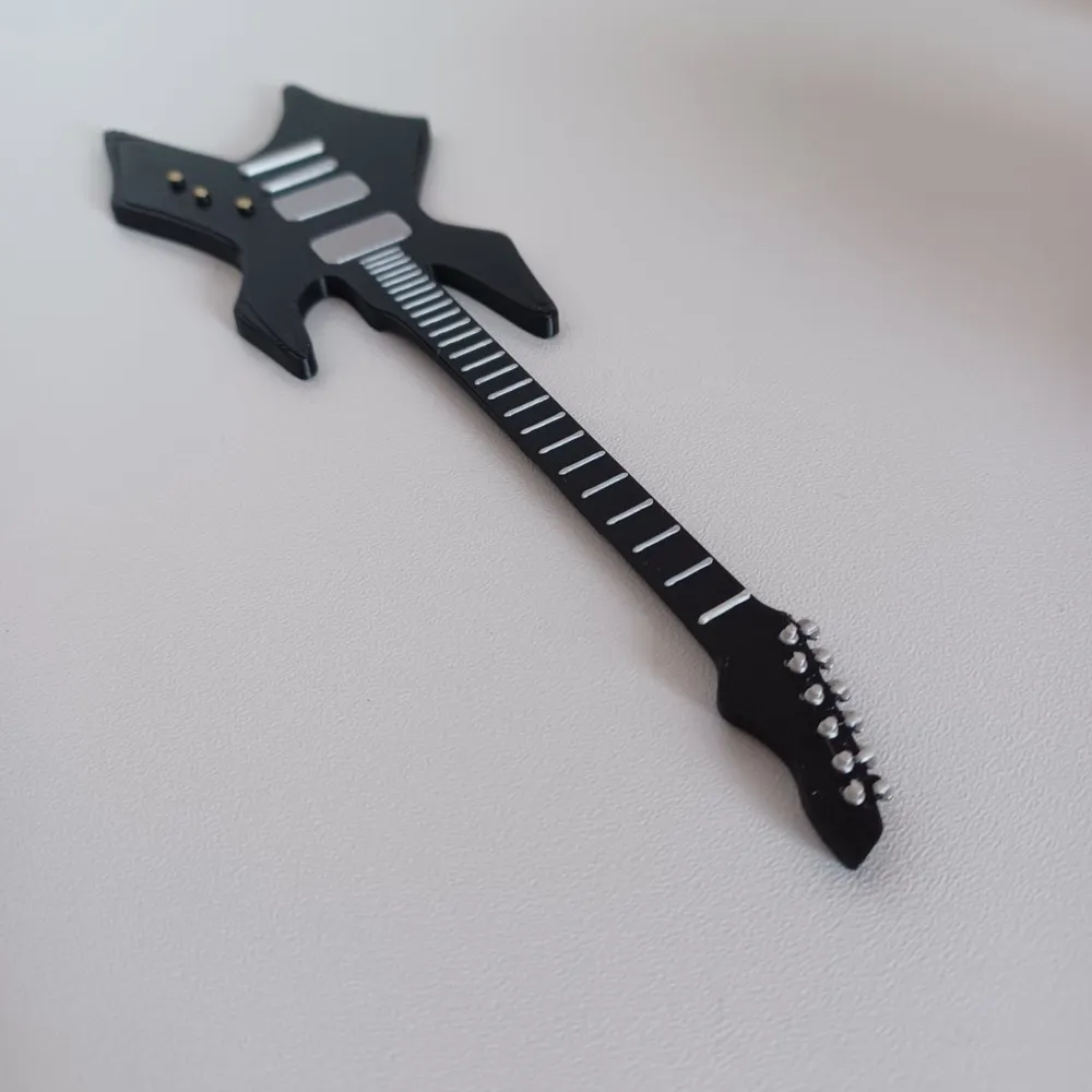 Mini guitarra eléctrica - Modelo de impresión 3D gratuito - MakerWorld