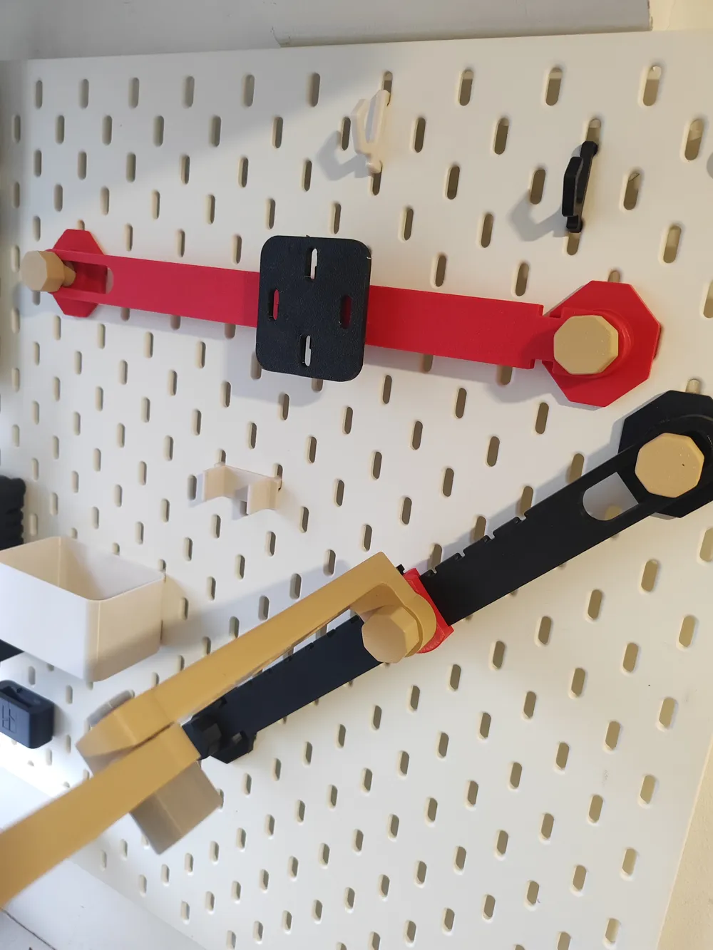 Round holes, square holes, IKEA SKADIS pegboard robotic arm, with ...