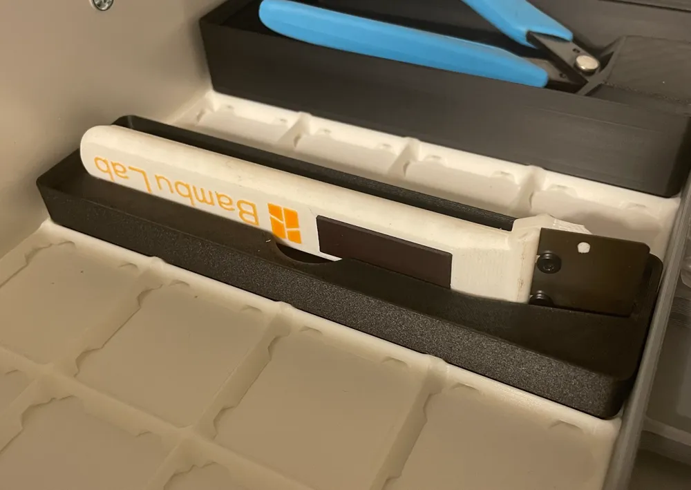 Gridfinity 1x4 Bambu Scraper Holder by OLD_FART MakerWorld: Download ...