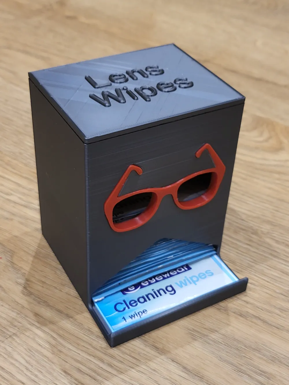 Lens Wipe Dispenser by K32Designs - MakerWorld