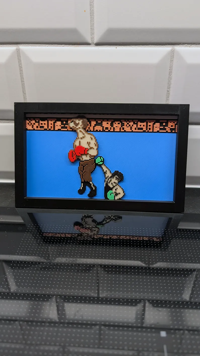 Punch Out Wall Art by LayeredPixels by Tomas MakerWorld: Download Free 3D Models