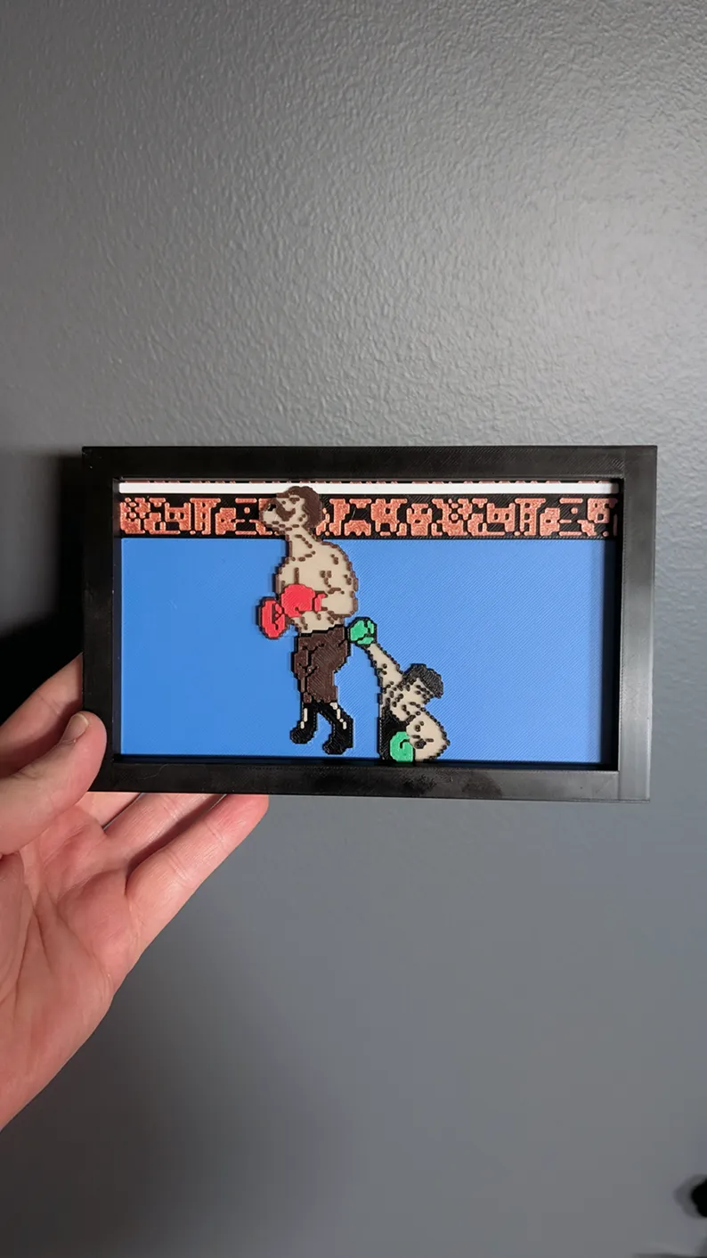 Punch Out Wall Art by LayeredPixels by Tomas MakerWorld: Download Free 3D Models