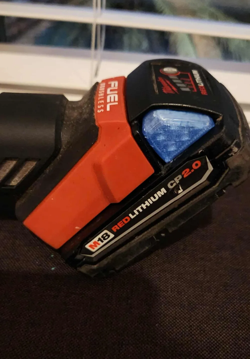 Milwaukee M18 battery release tab - Free 3D Print Model - MakerWorld