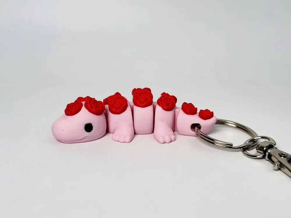 Articulated Rose Dino - Strong Joints - Free 3D Print Model - MakerWorld