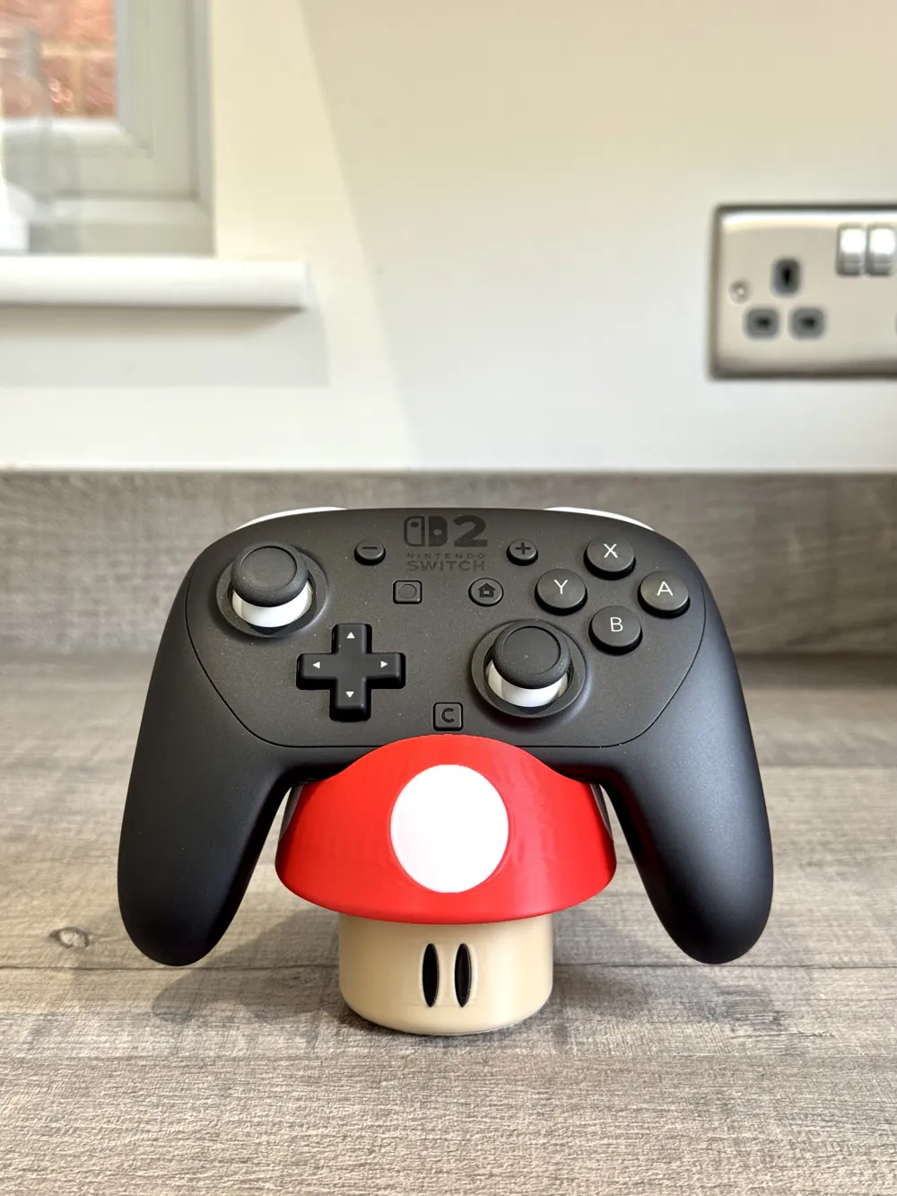 Soporte para mandos Nintendo Switch 2 Pro Controller tipo seta por Dave ...