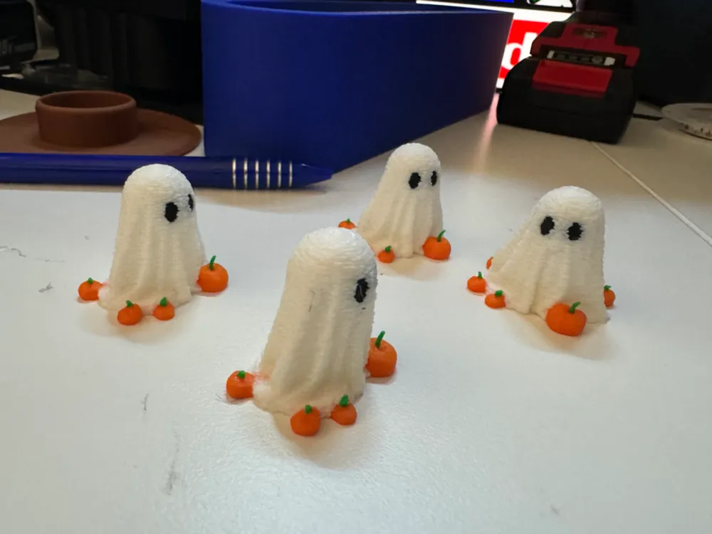 Mini Ghost for Halloween surrounded by pumpkins by vidguide MakerWorld ...