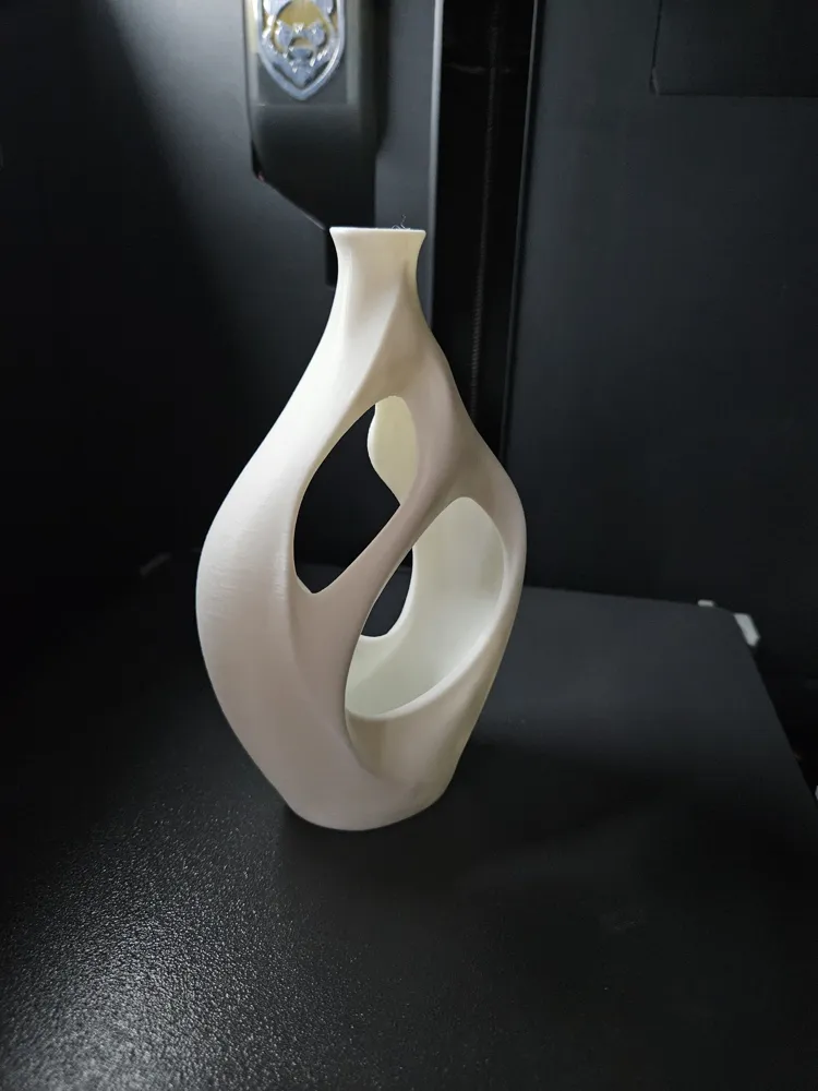 Modern Vase "Infinity Loop" - Free 3D Print Model - MakerWorld