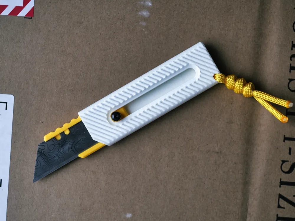 Slicey - EDC Utility Blade / Box Cutter by Downloaded Goods MakerWorld ...