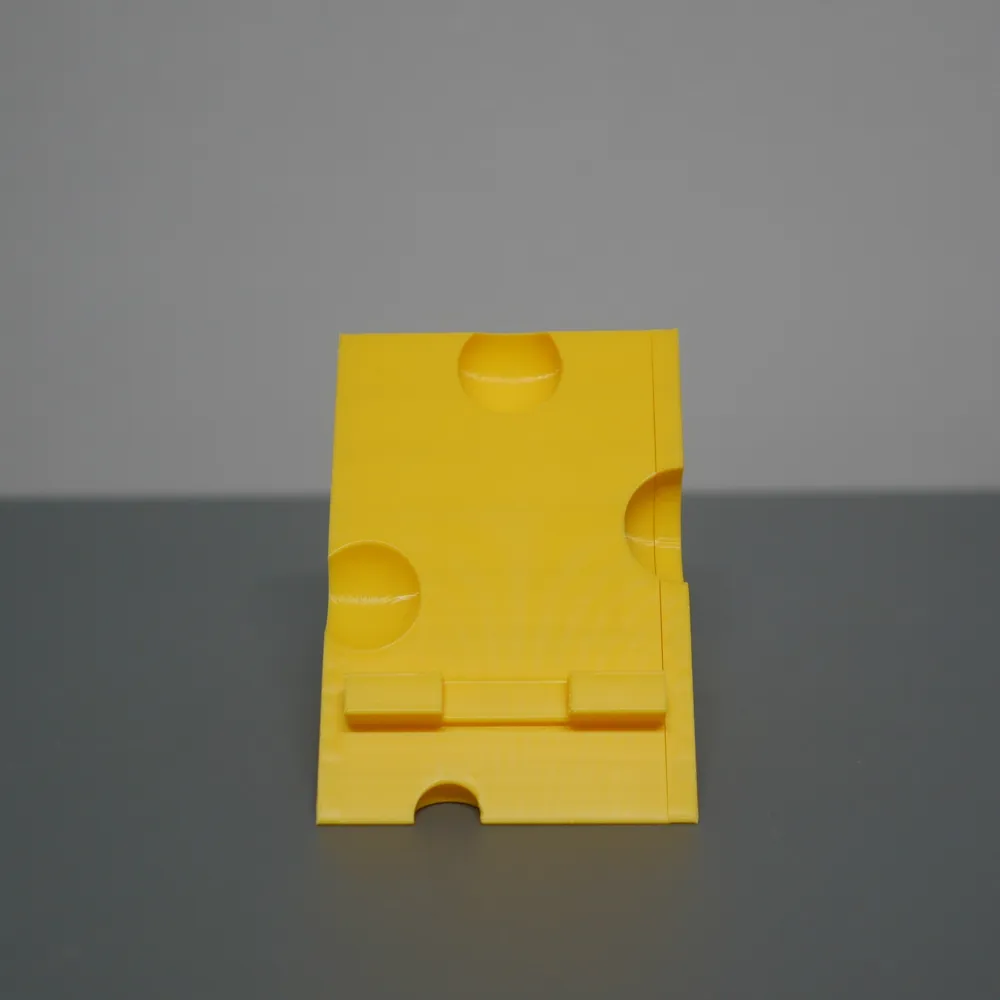 Base para teléfono con almacenamiento de queso cheddar - Modelo de ...