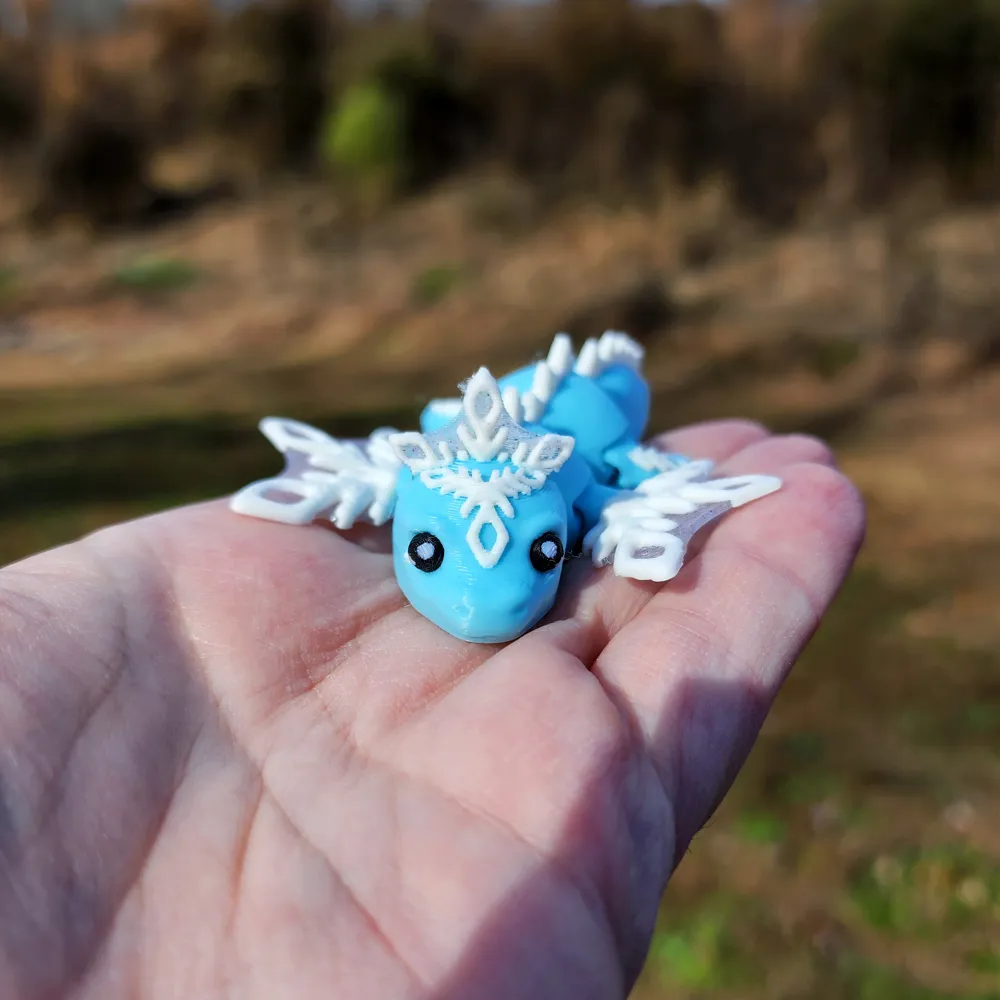 Articulated Snow Dragon by Cosmo Moore MakerWorld: Download Free 3D Models