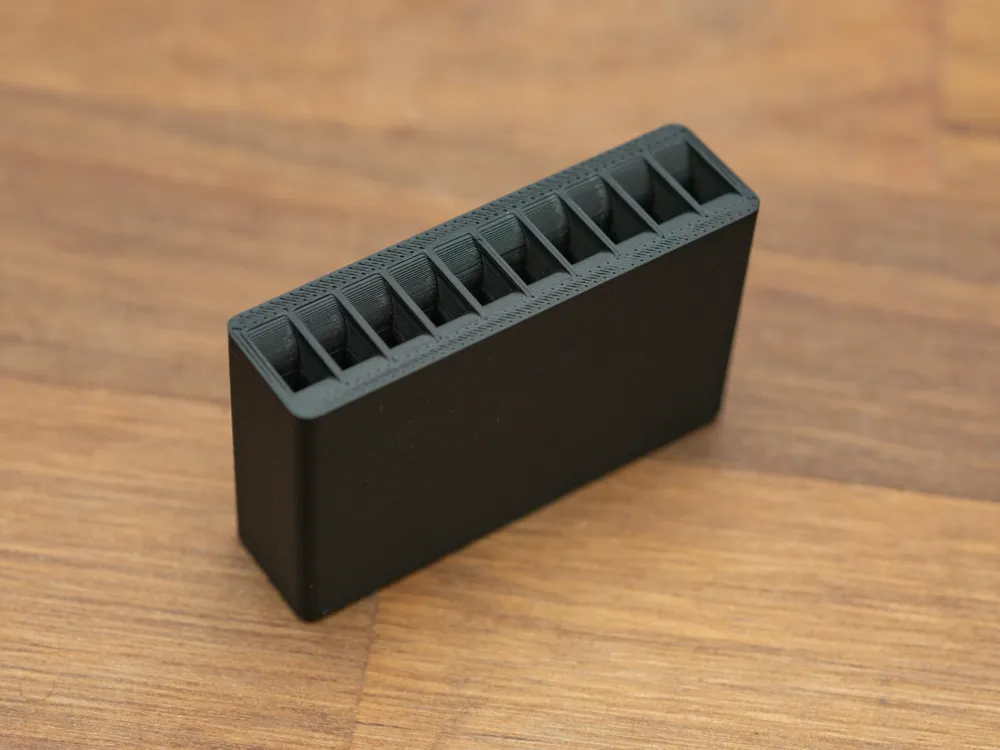 Customizable holder for micro hooks by flummer - MakerWorld