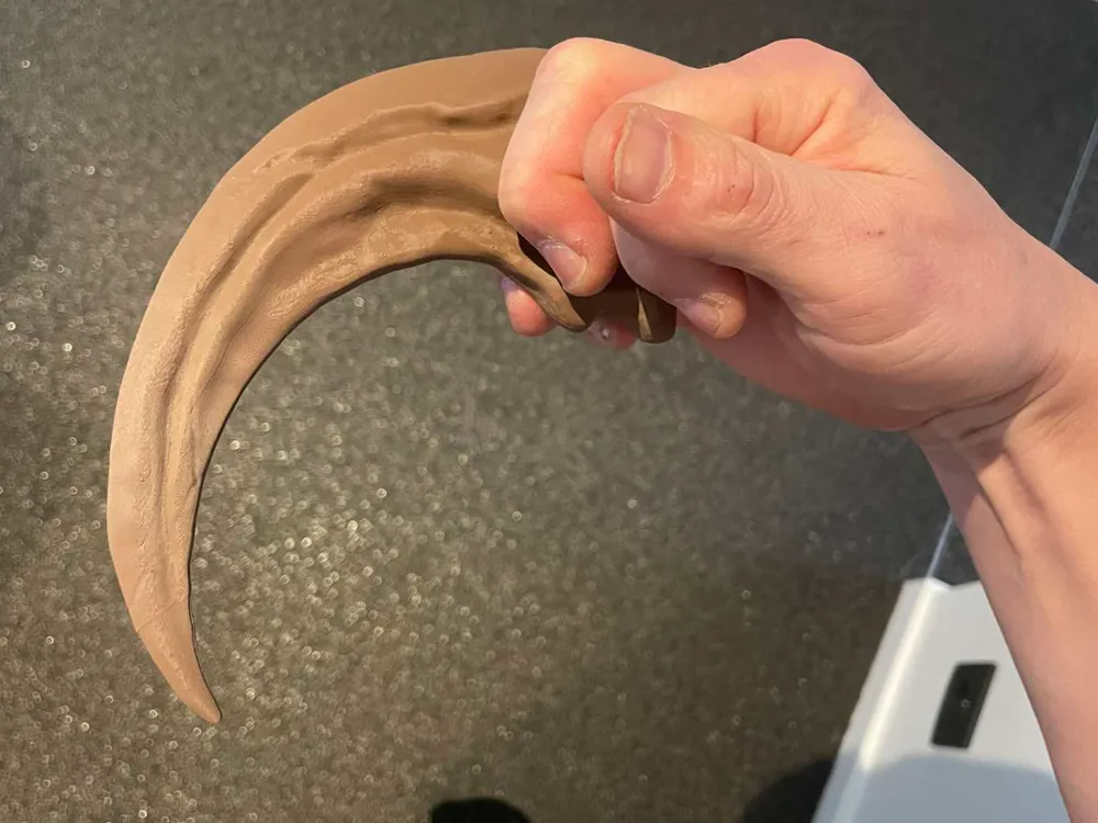 Velociraptor claw fossil replica by SID - MakerWorld