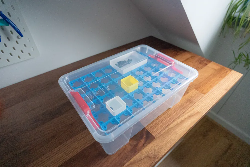 Three handle designs for a Gridfinity storage solution tailored to Samla 11L boxes by Mai ...