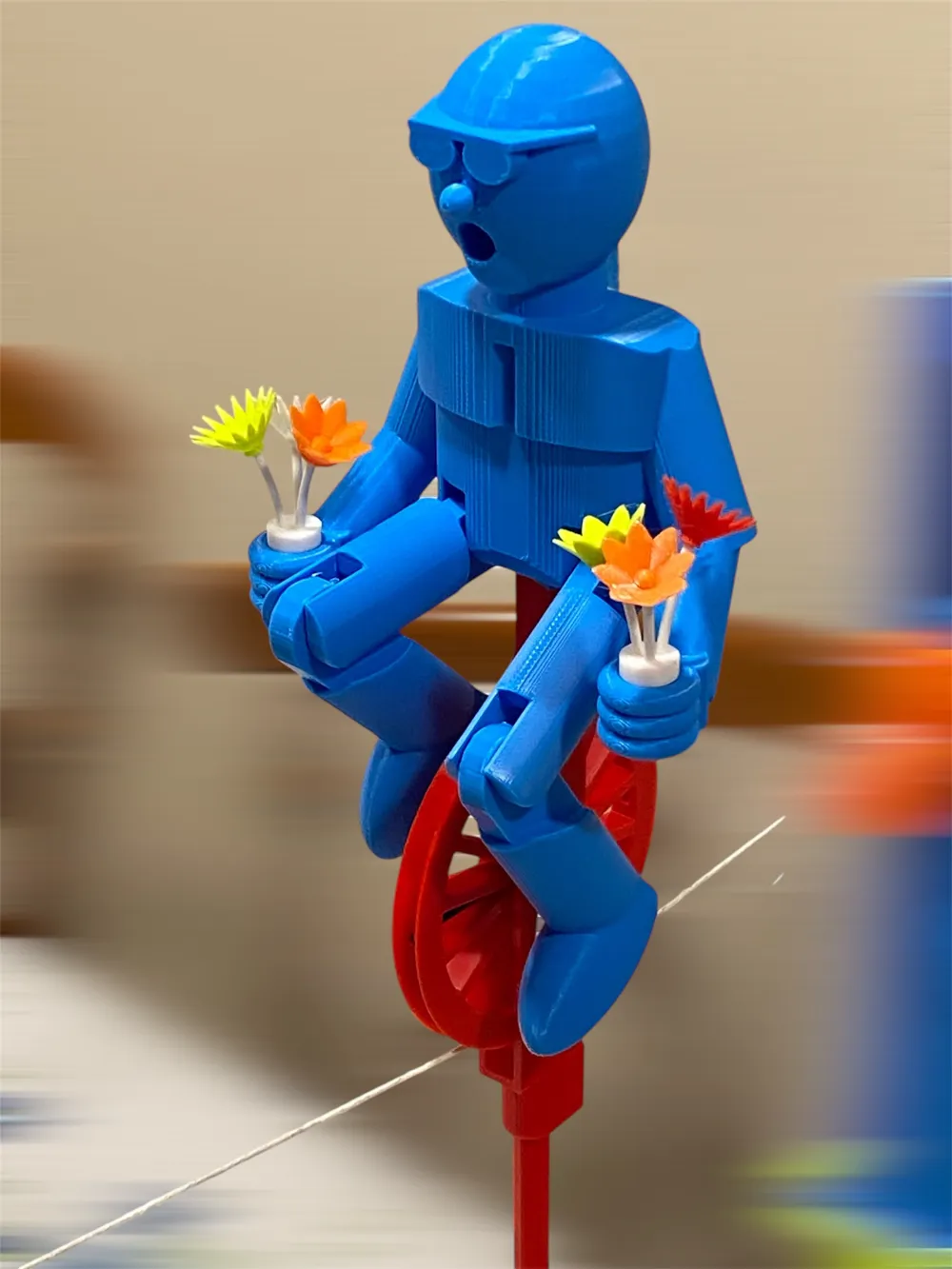 Animated Unicycle Rider on a Tightrope - Free 3D Print Model - MakerWorld