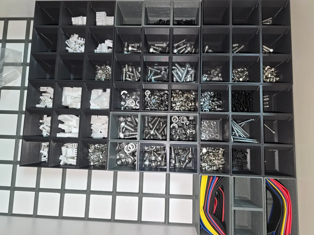 Grid organizer boxes with grid bottom. by mariusht133 - MakerWorld