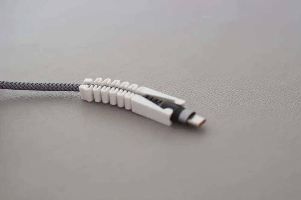USB-C universal cable saver by NordcaForm MakerWorld: Download Free 3D ...