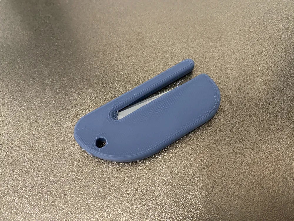 Paper / box cutter with internal blade by eccs19 MakerWorld: Download ...