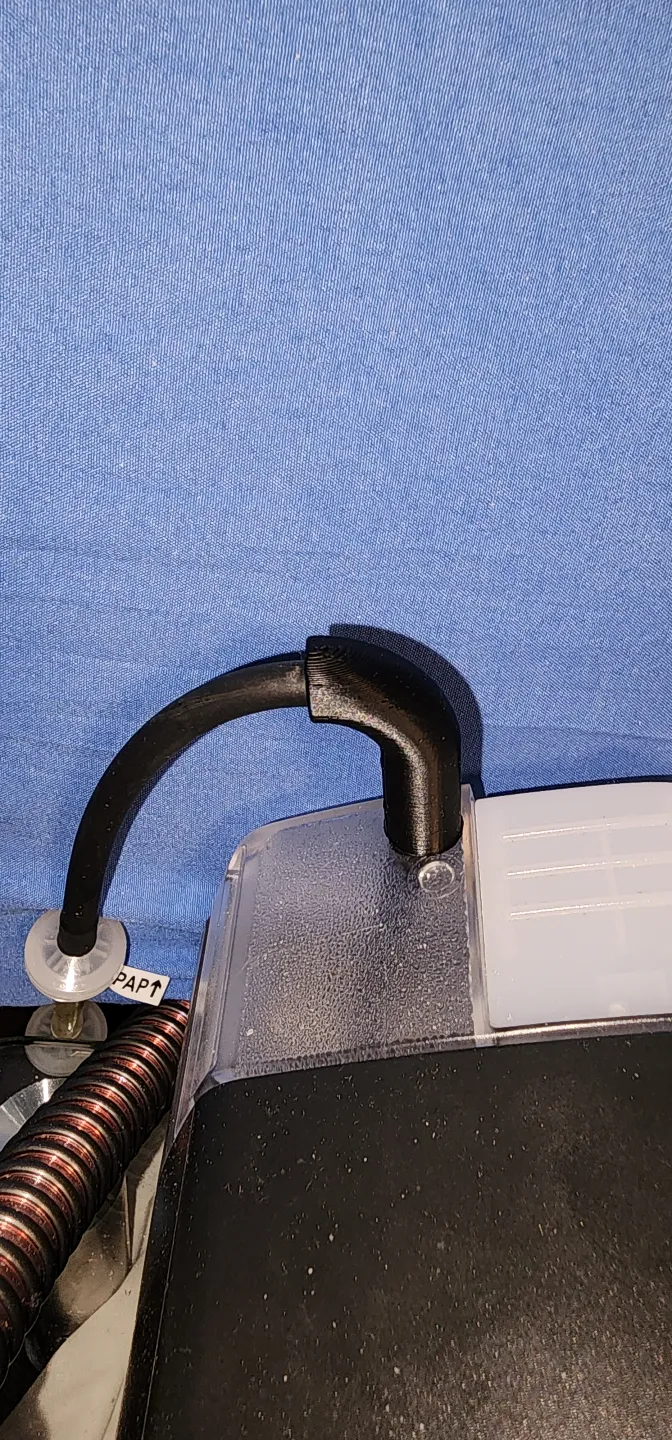 Resmed 10 - soclean water tank hose strain relief by Nick_A - MakerWorld