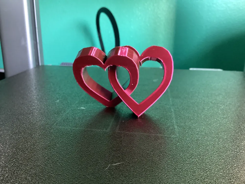 Interlocked hearts by Bob - MakerWorld