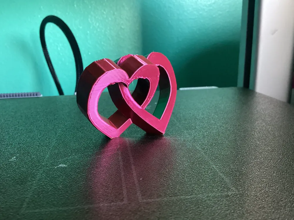 Interlocked hearts by Bob - MakerWorld