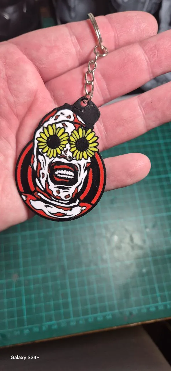 Art the clown terrifier sunflower smile keychain by Mon3d MakerWorld ...
