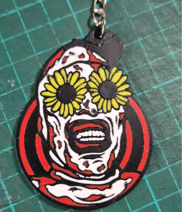 Art the clown terrifier sunflower smile keychain by Mon3d MakerWorld ...