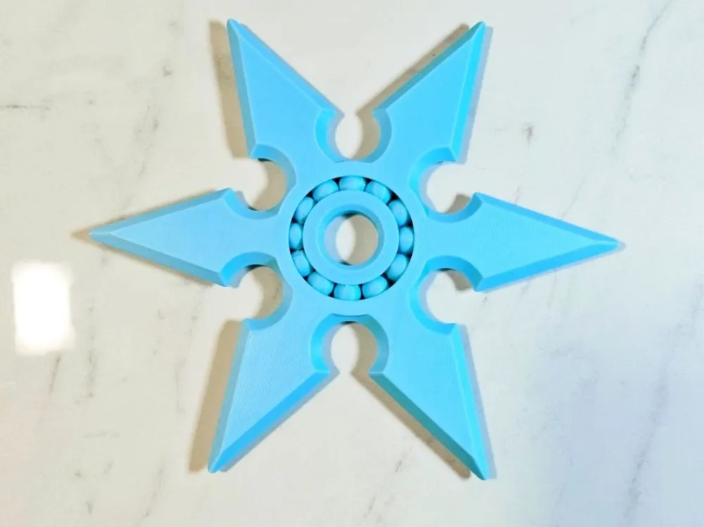 Fidget Ninja Star Spinner - Free 3D Print Model - MakerWorld