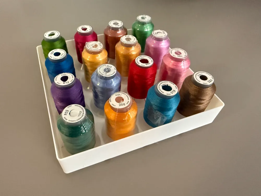 Gridfinity 4 X 4 39mm diameter thread spool bin by Mark Andrew - MakerWorld