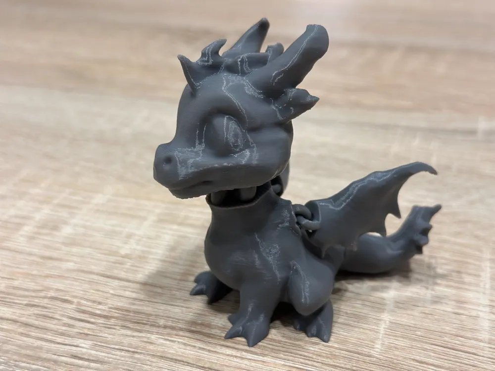 Cute articulated baby dragon by 3Dcrabi MakerWorld: Download Free 3D Models