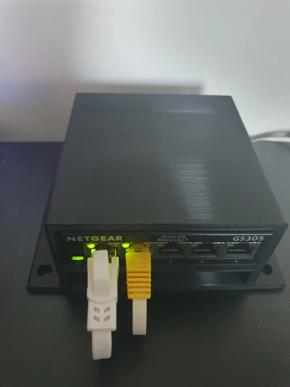 Netgear GS305 organizer / mount by ThWi MakerWorld: Download Free 3D Models