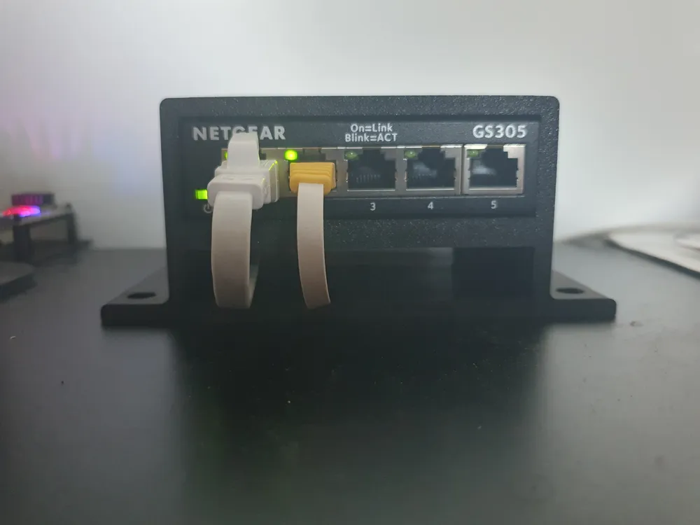 Netgear GS305 organizer / mount by ThWi MakerWorld: Download Free 3D Models