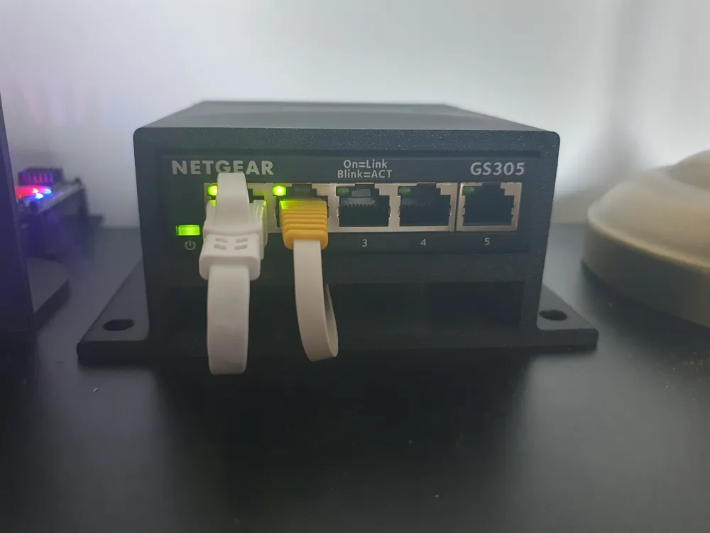 Netgear GS305 organizer / mount by ThWi MakerWorld: Download Free 3D Models