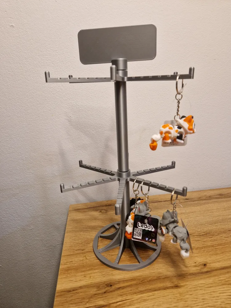 Rotatable Stand for Jewelry & Keychains - Free 3D Print Model - MakerWorld