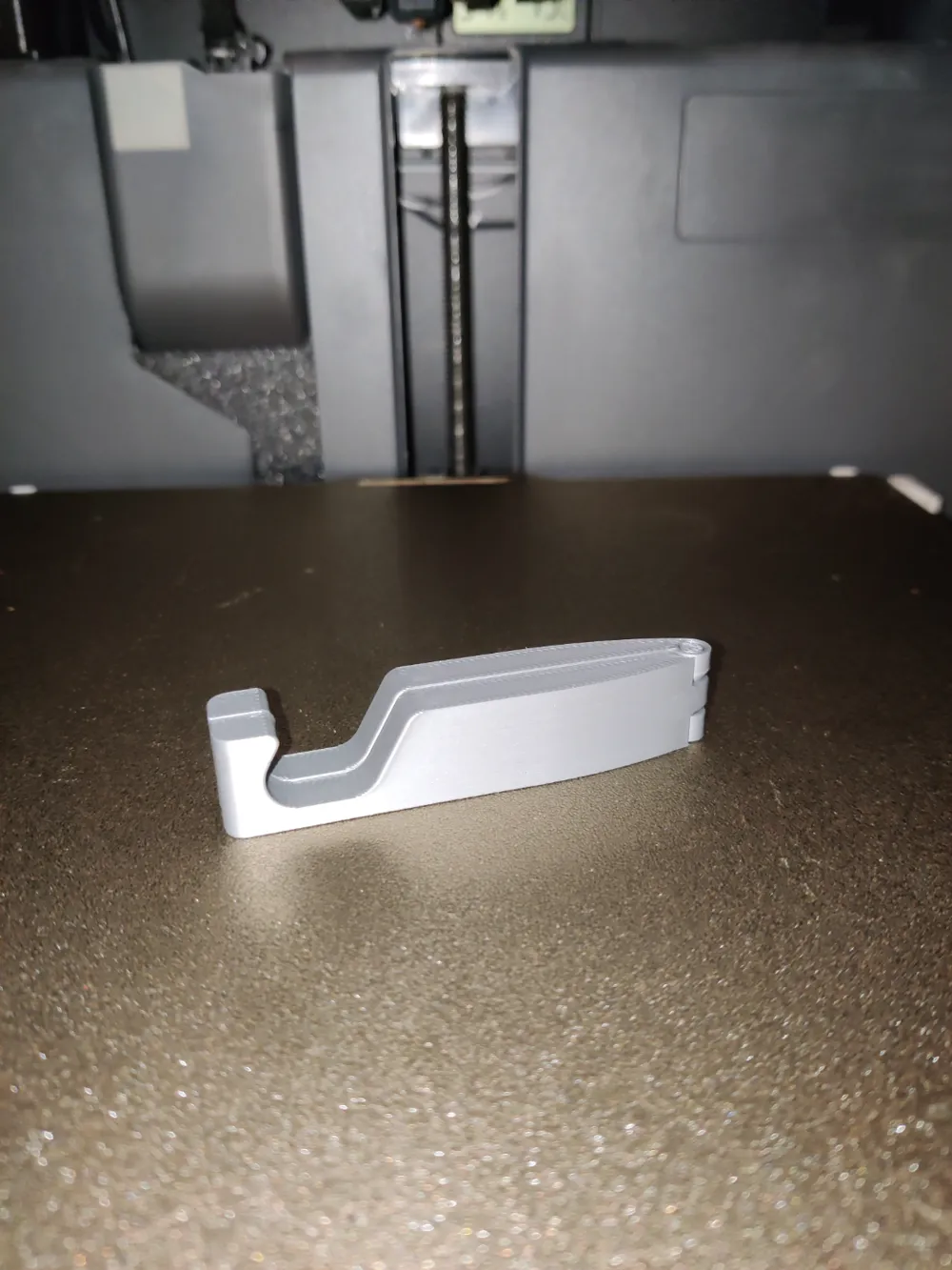 Portable smartphone stand (Print in place) by Disttrack3D - MakerWorld