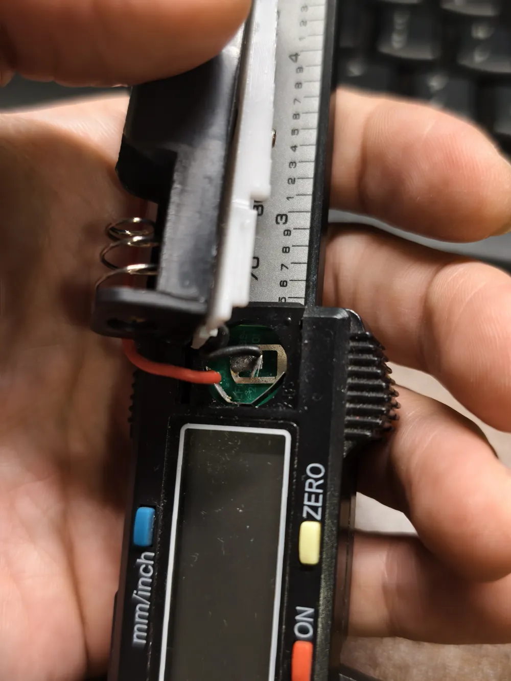 Vernier caliper button battery to AA battery conversion by 山东达文西 ...