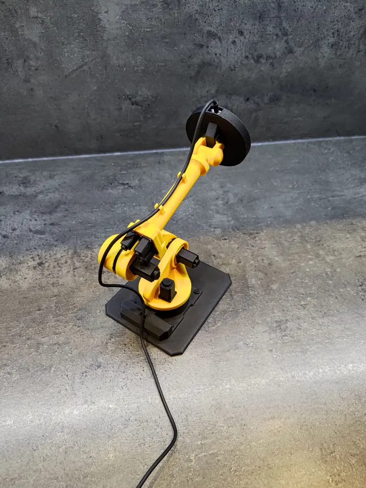 ROBOT PHONE STAND - Free 3D Print Model - MakerWorld