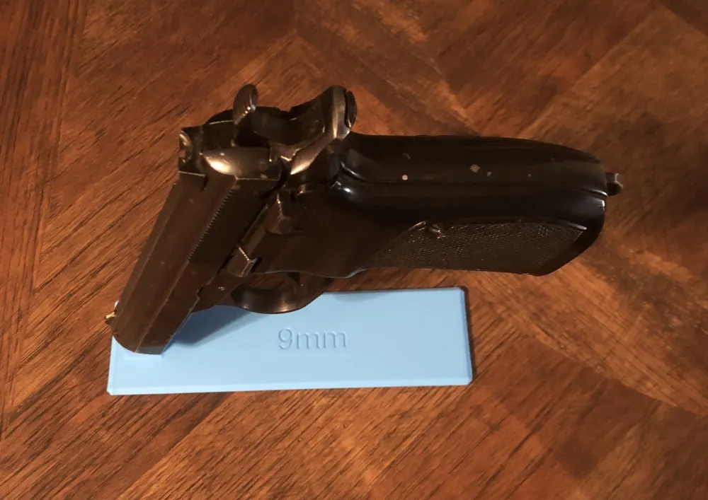 9mm Pistol Stand by Naughty Engineer - MakerWorld