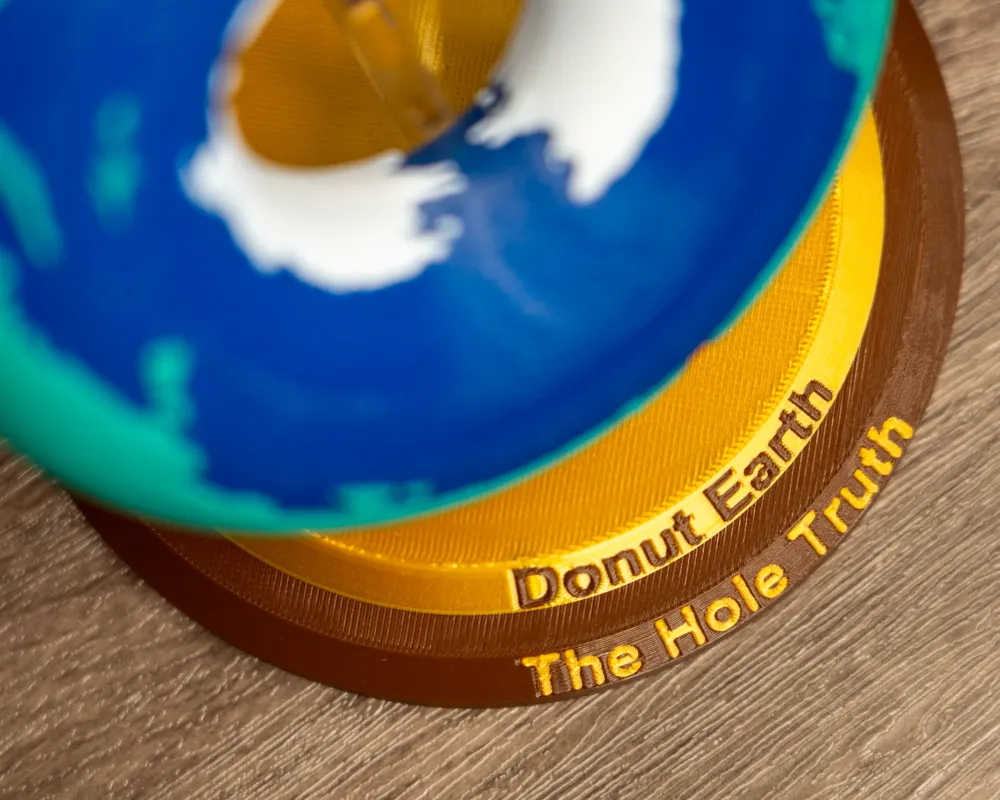 Donut Earth - The Hole Truth by altair3d - MakerWorld