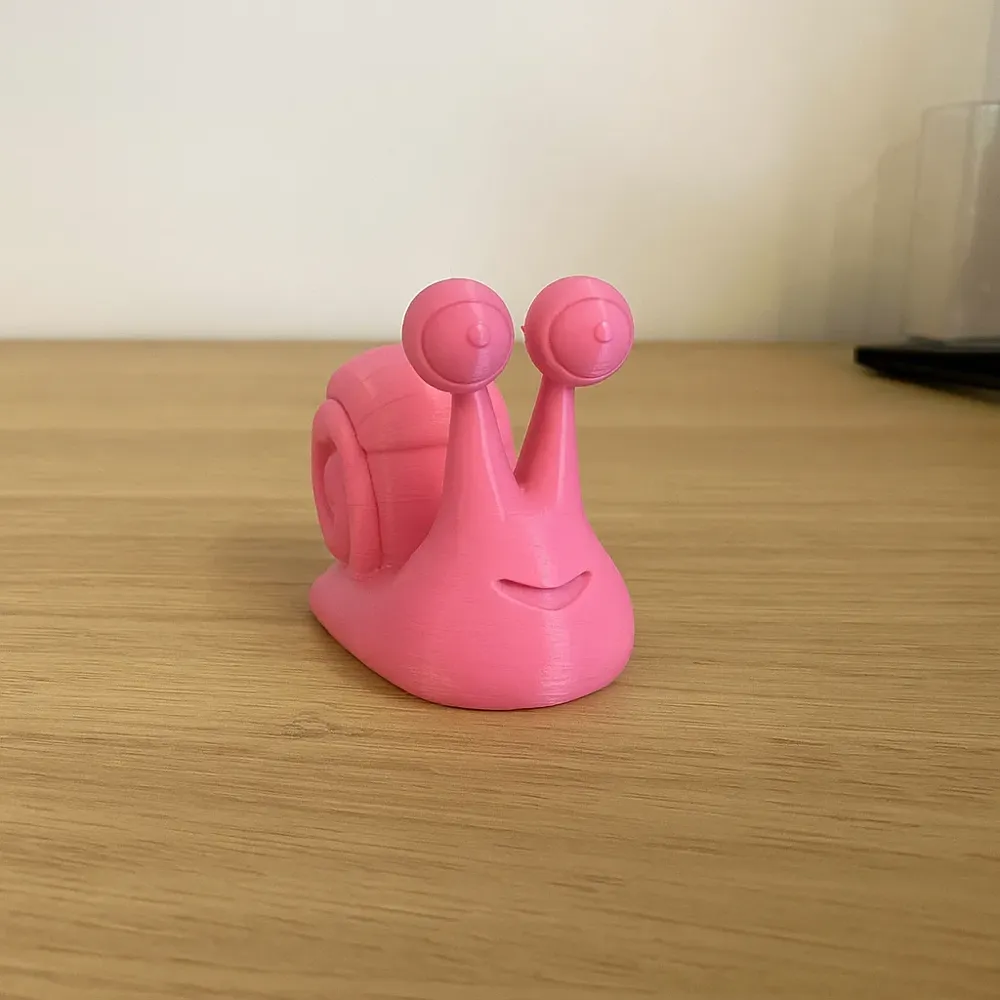 Smiling snail figurine - Free 3D Print Model - MakerWorld