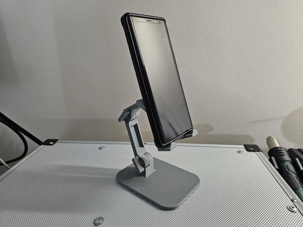 Adjustable Phone Holder Stand - Free 3D Print Model - MakerWorld