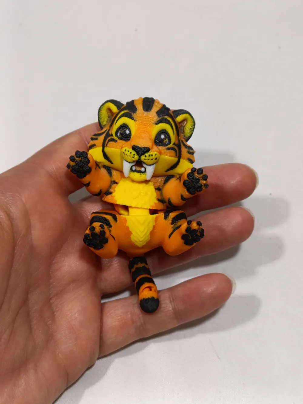 saber tooth tiger flexi - Free 3D Print Model - MakerWorld