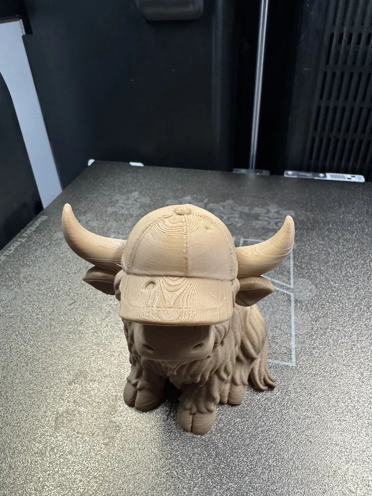 Highland Cow with Cap - Free 3D Print Model - MakerWorld