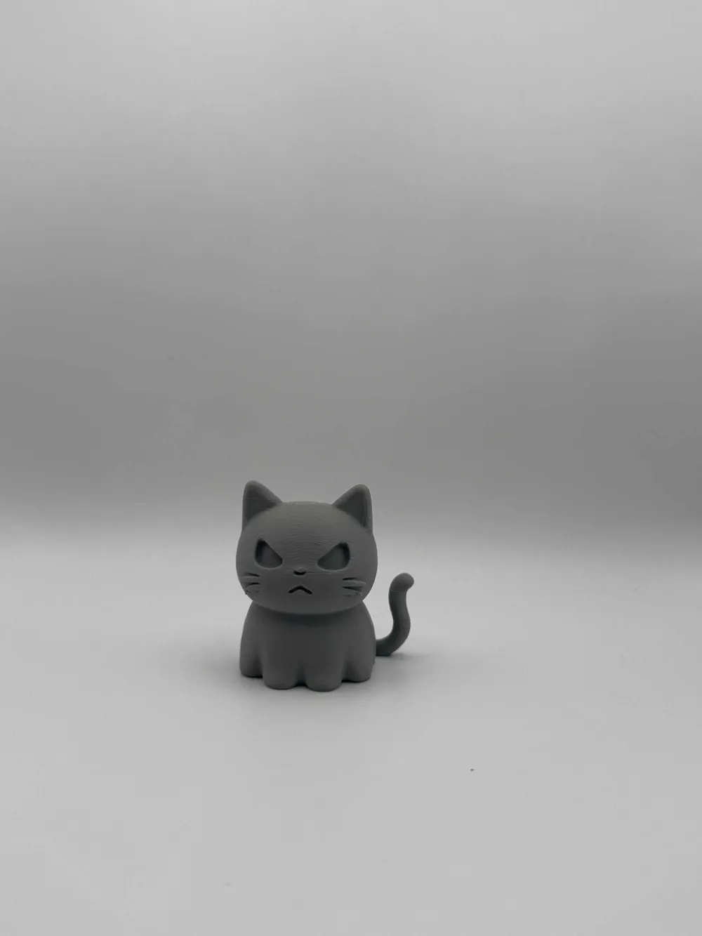 Grumpy Chibi Cat Figurine by humilak MakerWorld: Download Free 3D Models