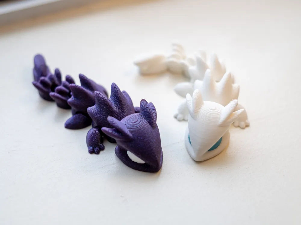 Mini Articulated Dragon 02 by Printzee MakerWorld: Download Free 3D Models