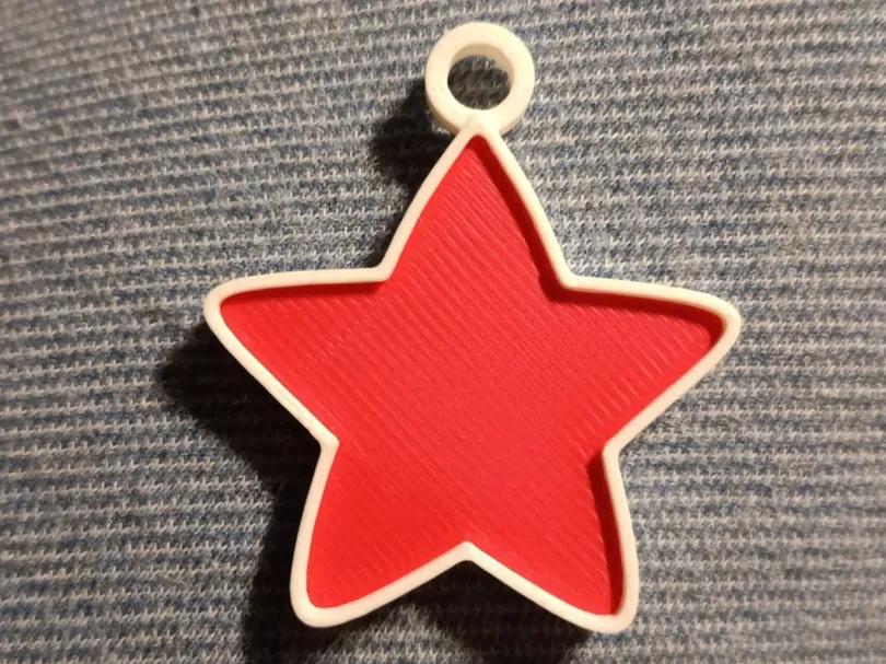 Chaveiro Estrela de Natal por Mathis MakerWorld: Baixe modelos 3D gratuitos